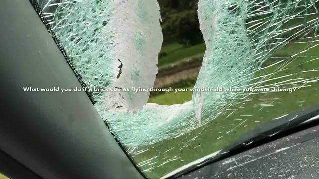 Driver Hurt When Brick Thrown Through Windshield